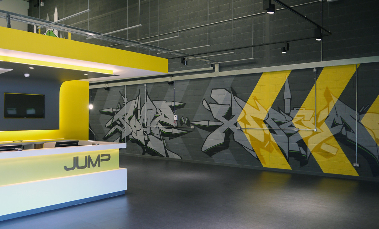 Graffiti Mural Transformation of Trampoline Park – Soulful Creative